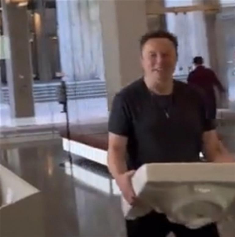 Musk visits Twitter HQ, with a sink in his hand